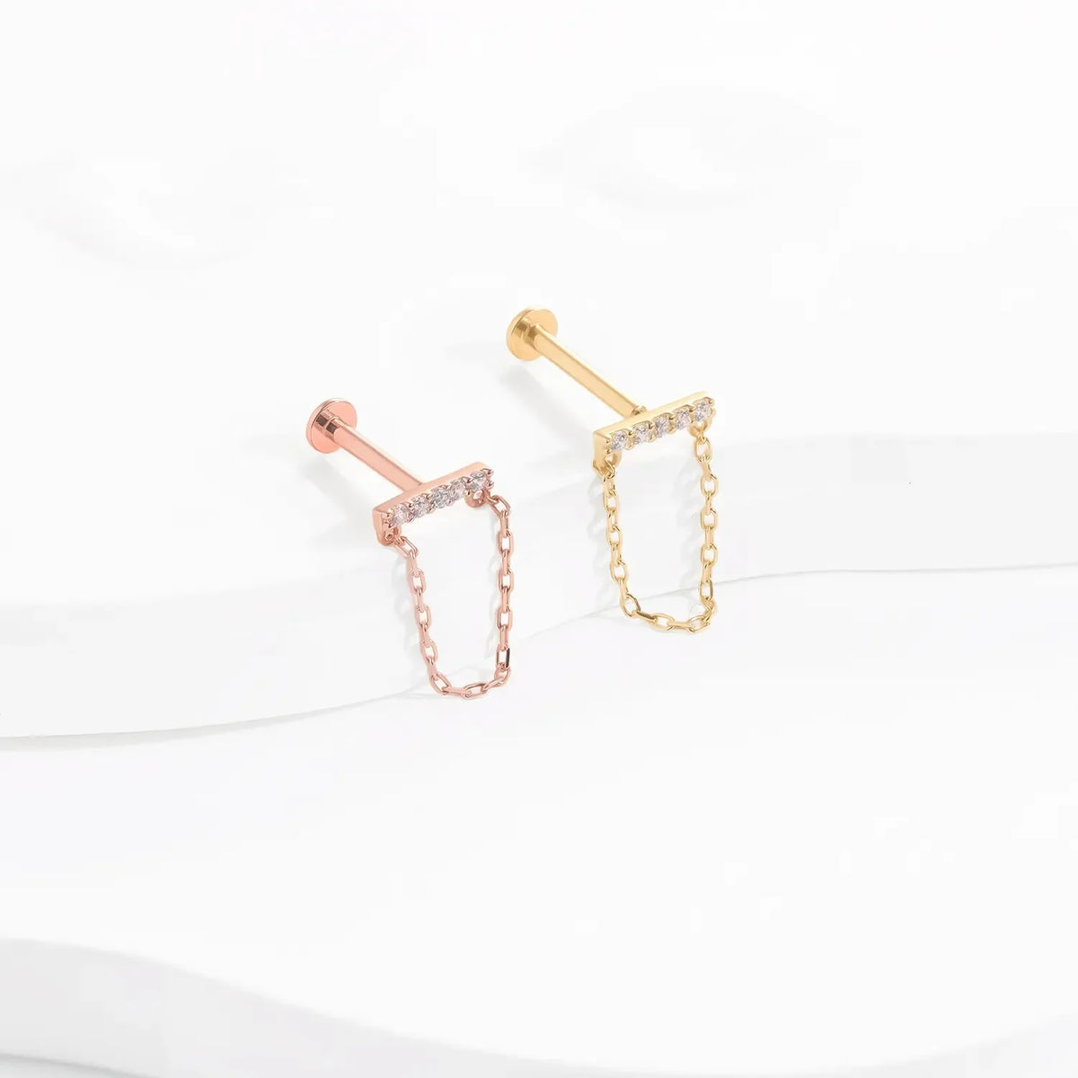 14K gold Hidden Helix piercing with a chain and clear cz stones rose g ...