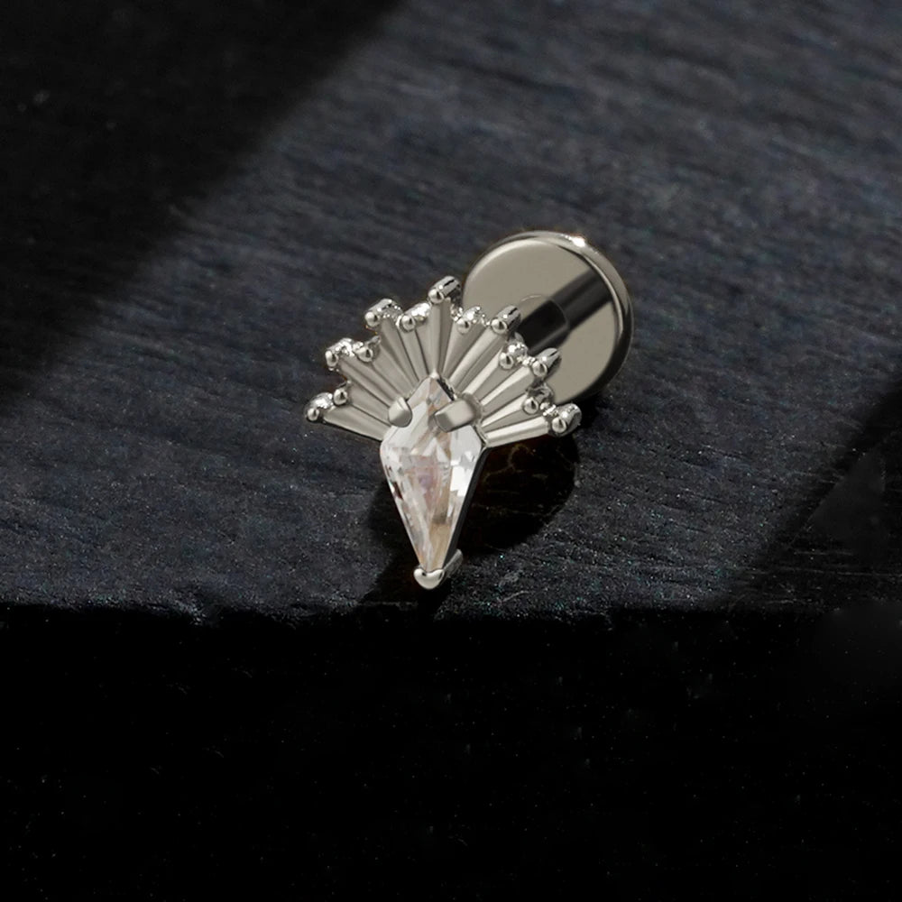 Red nose piercing with a kite-shaped stone available in black and clea ...