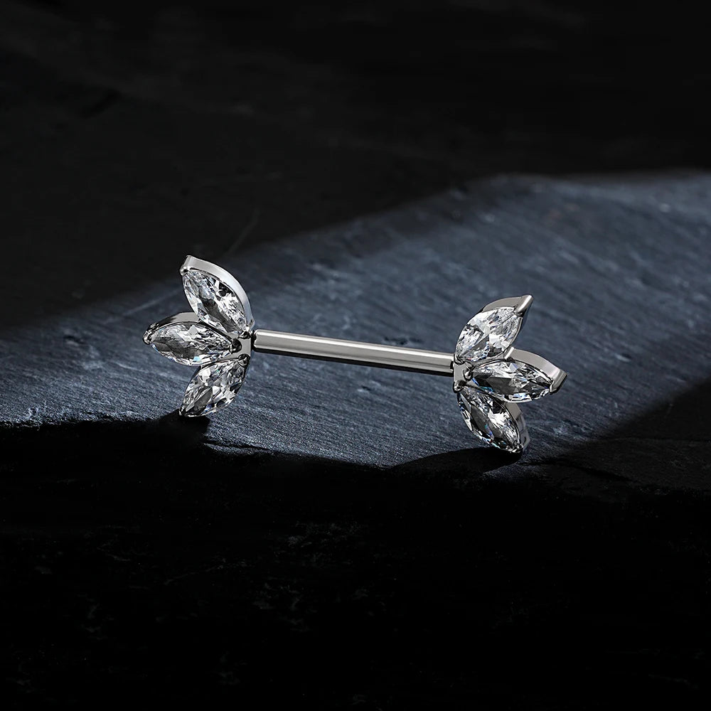 Gold nipple piercing with three clear diamond cz stones on each side t ...