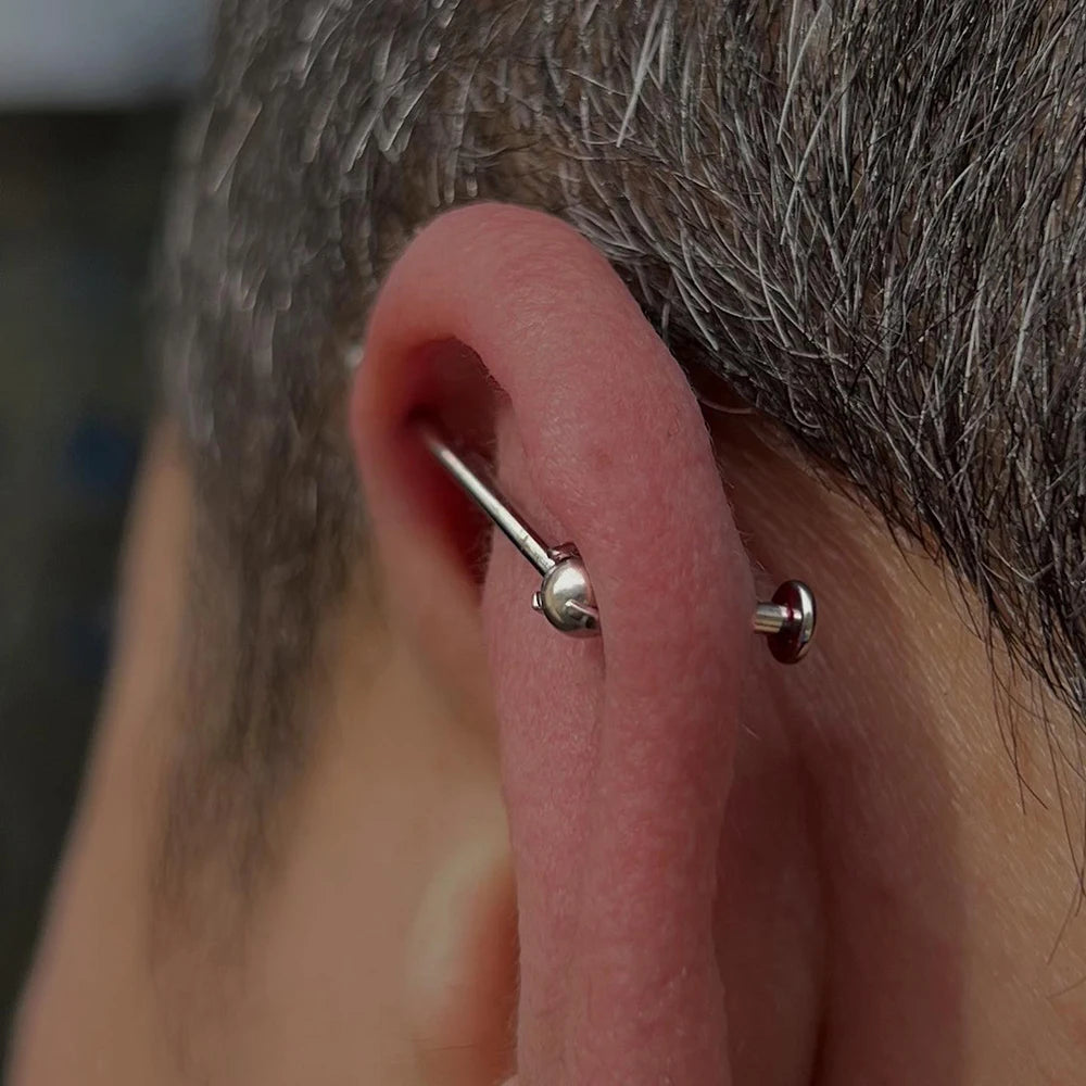 Floating industrial piercing 14G made of titanium half floating indust ...